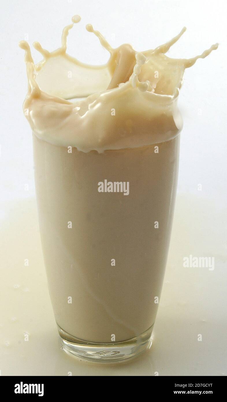 soybean milk splash Stock Photo - Alamy