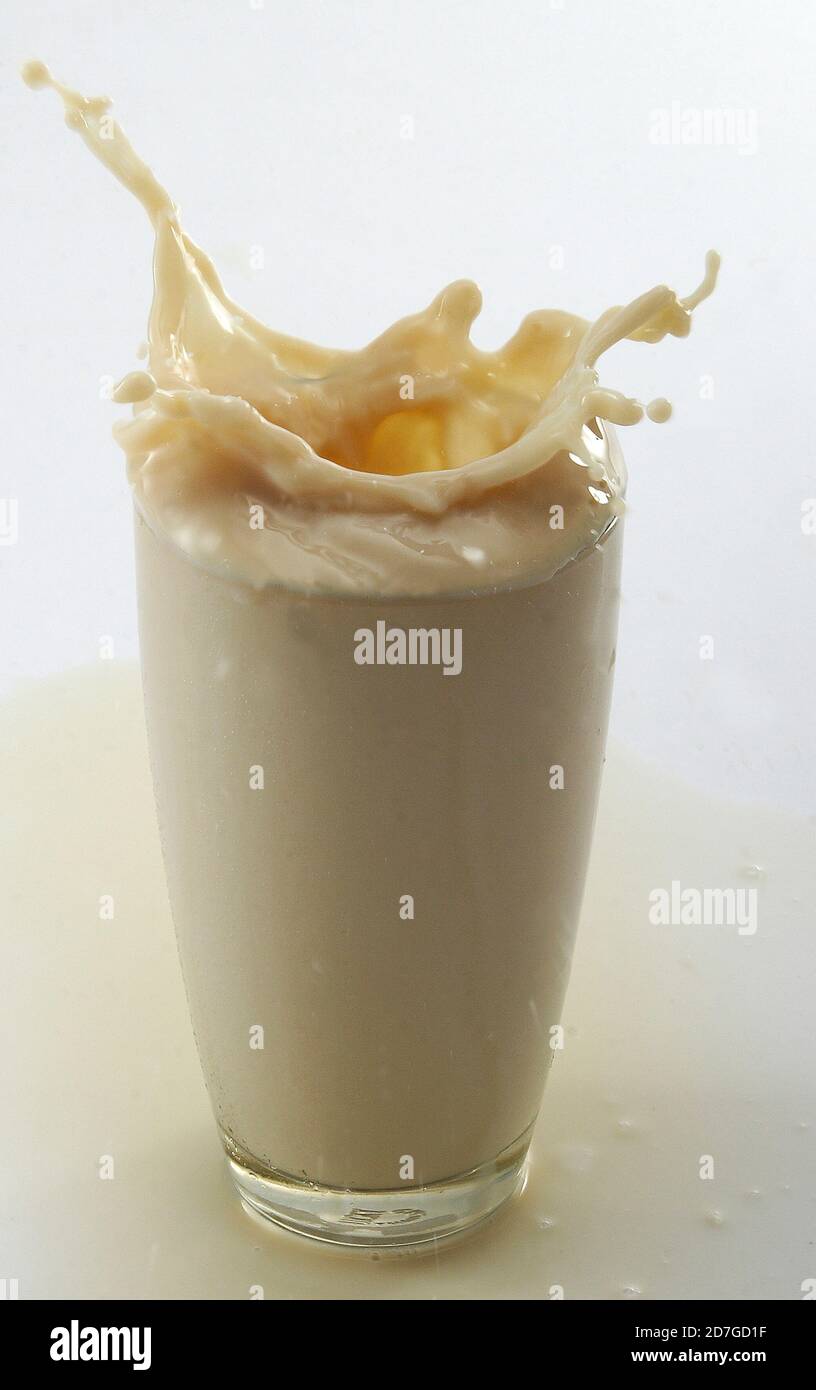 soybean milk splash Stock Photo - Alamy