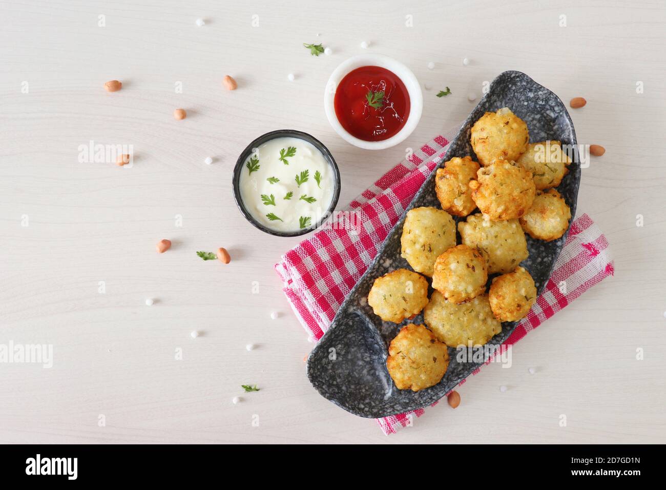 Sabudana vada or Sago fried fitters served with Curd or yogurt and ...