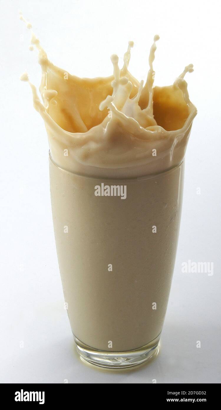 soybean milk splash Stock Photo - Alamy