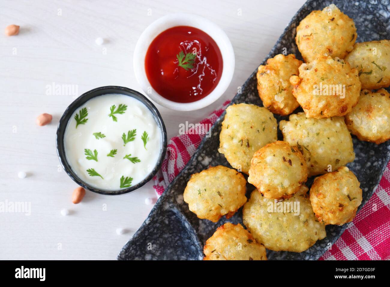 Sabudana vada or Sago fried fitters served with Curd or yogurt and ...