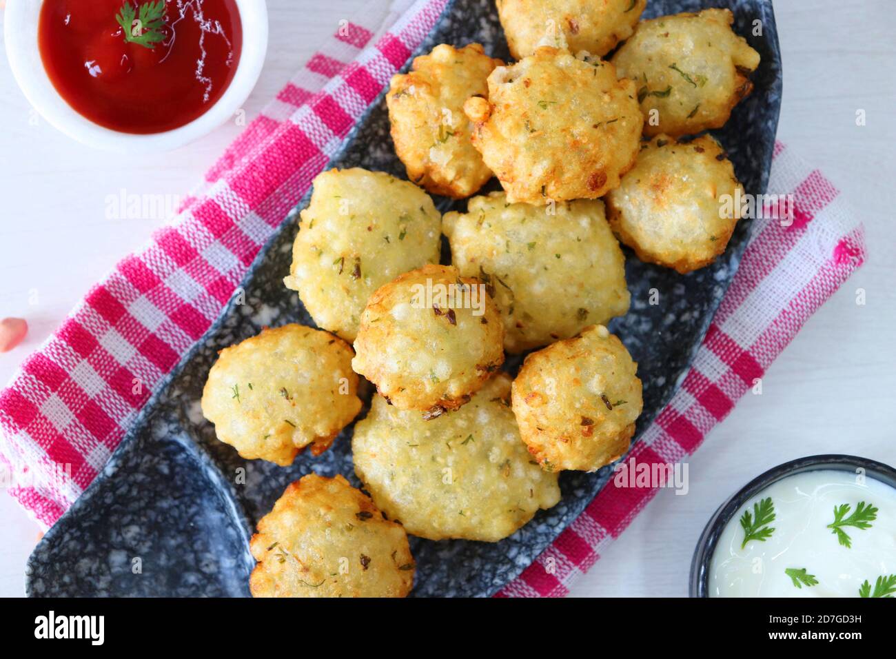 Sabudana vada or Sago fried fitters served with Curd or yogurt and ...