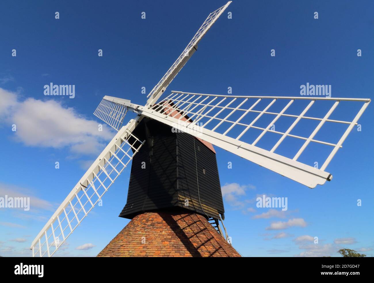 Stevington, UK. 22nd Oct, 2020. Historic windmill under blue autumn ...