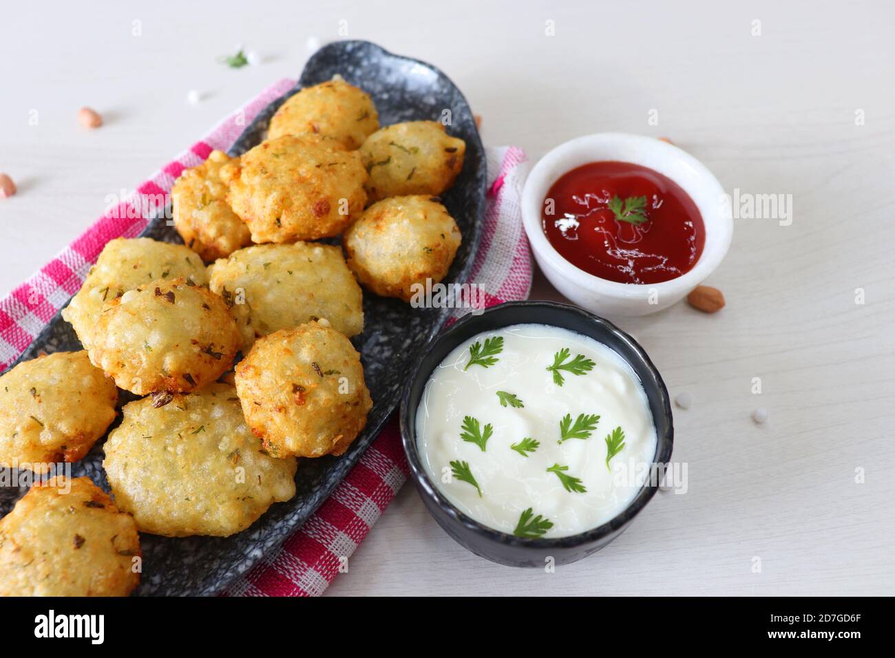 Sabudana vada or Sago fried fitters served with Curd or yogurt and ...