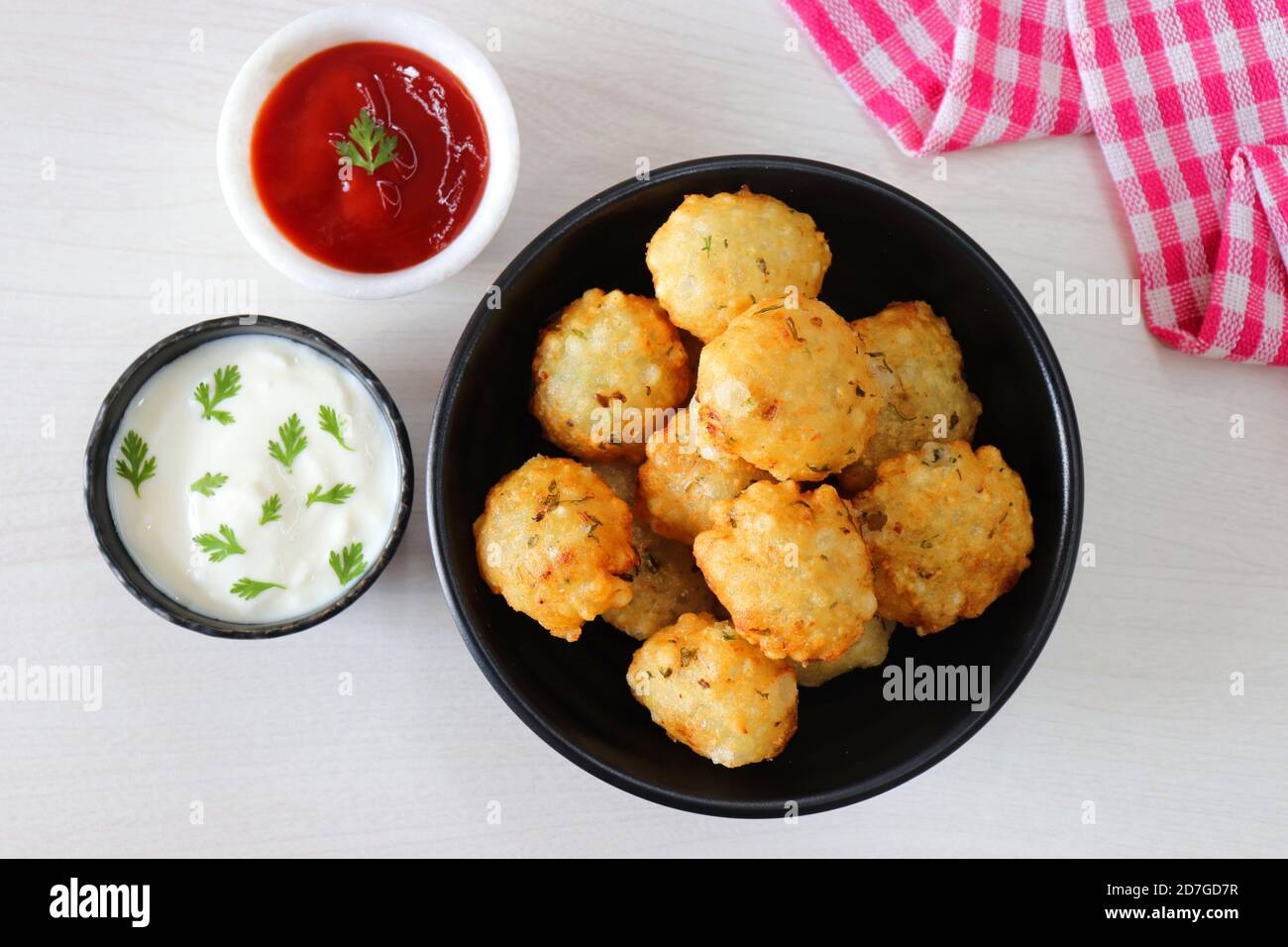 Sabudana vada or Sago fried fitters served with Curd or yogurt and ...