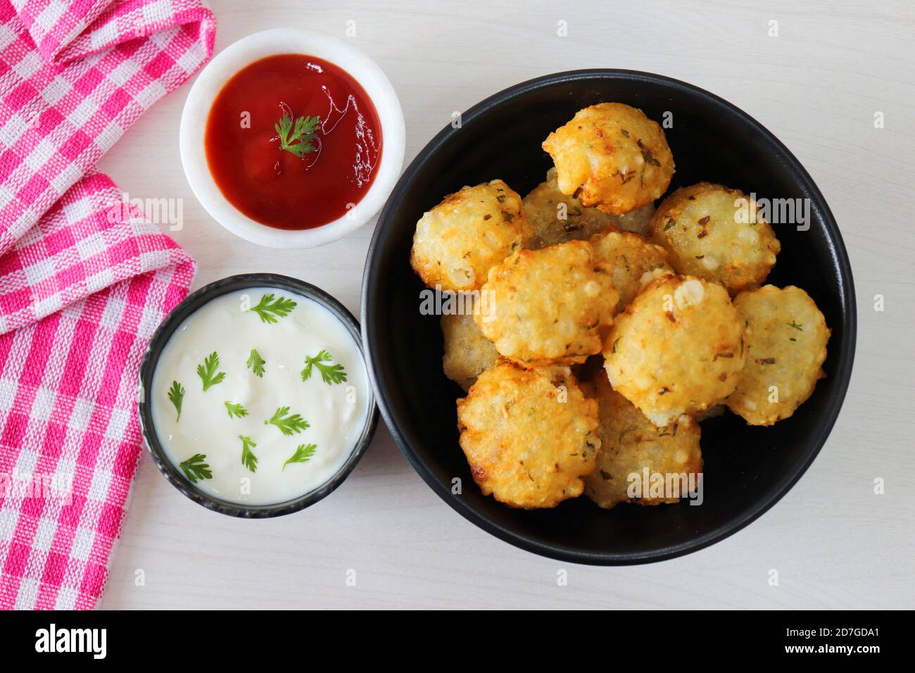 Sabudana vada or Sago fried fitters served with Curd or yogurt and ...