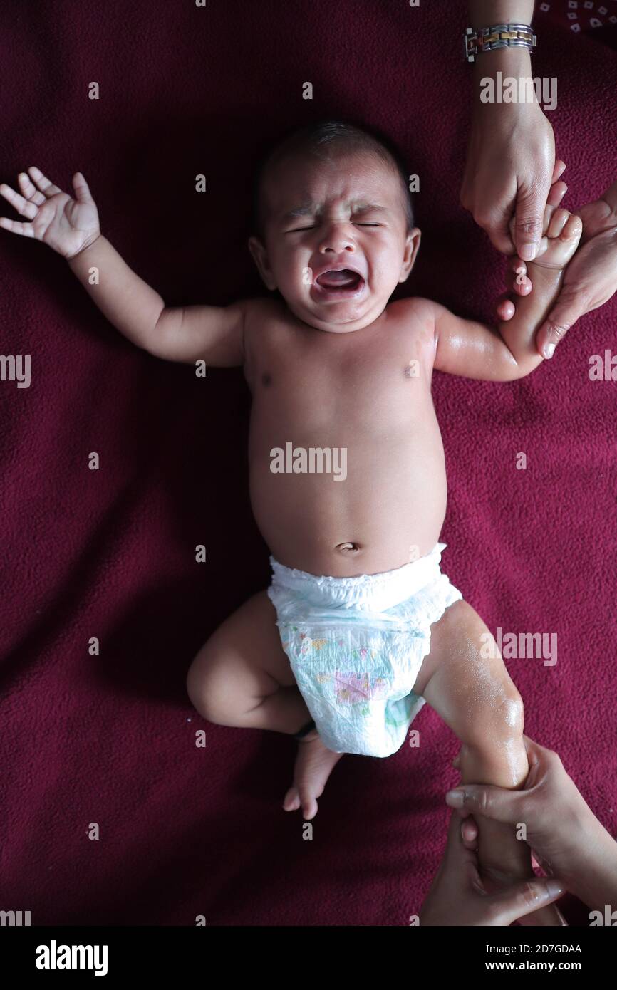 Kid crying mother leg hi-res stock photography and images - Alamy
