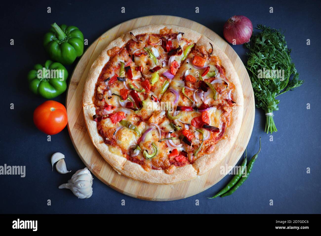 Food- Traditional Italian veggie pizza. Toppings are capsicum, corn ...