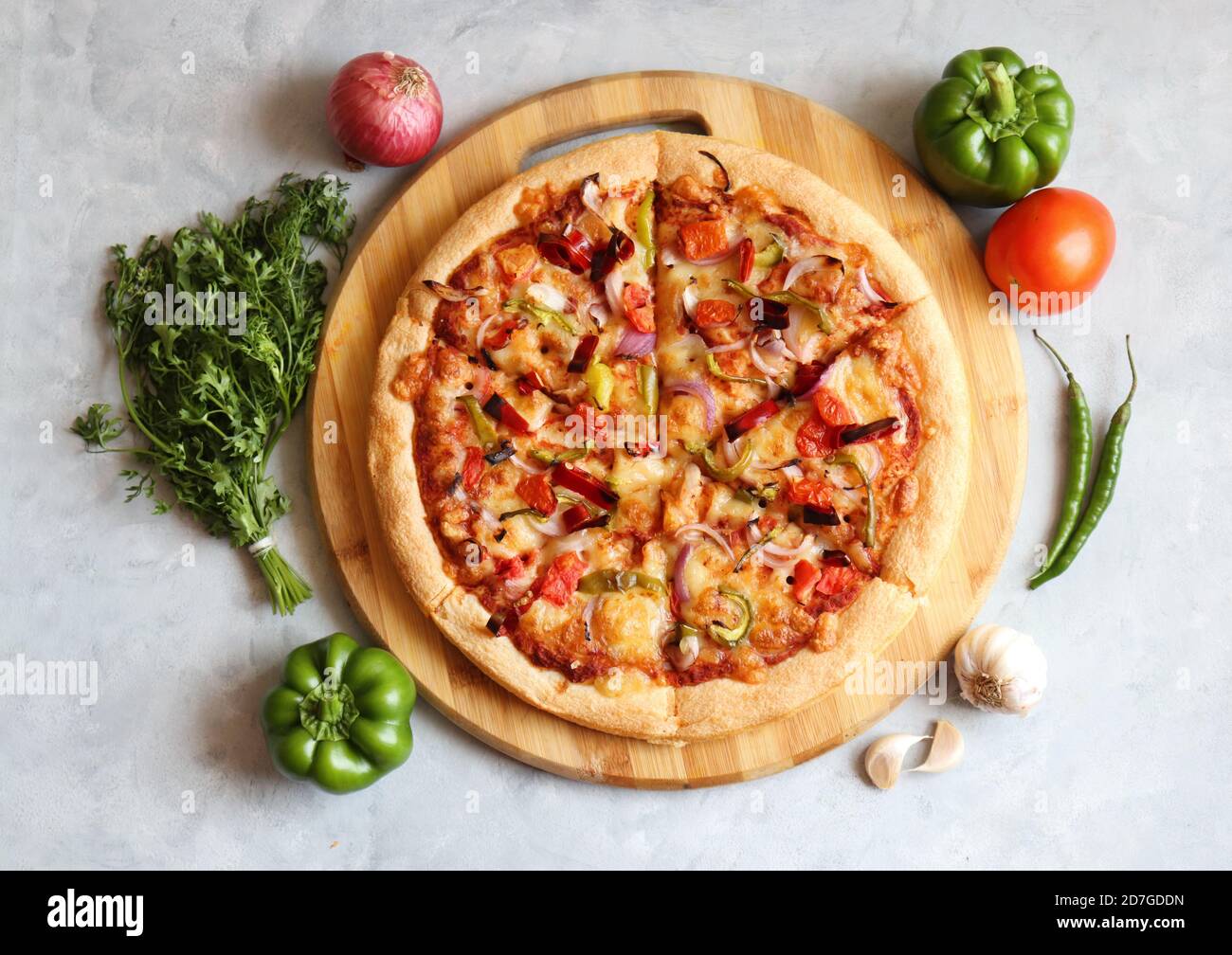 Food- Traditional Italian veggie pizza. Toppings are capsicum, corn ...