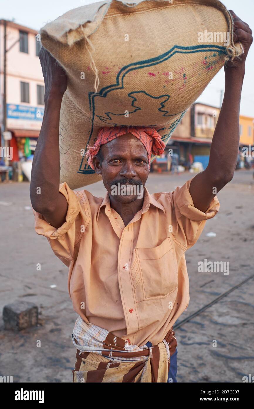 Worker Carrying Sack High Resolution Stock Photography and Images - Alamy