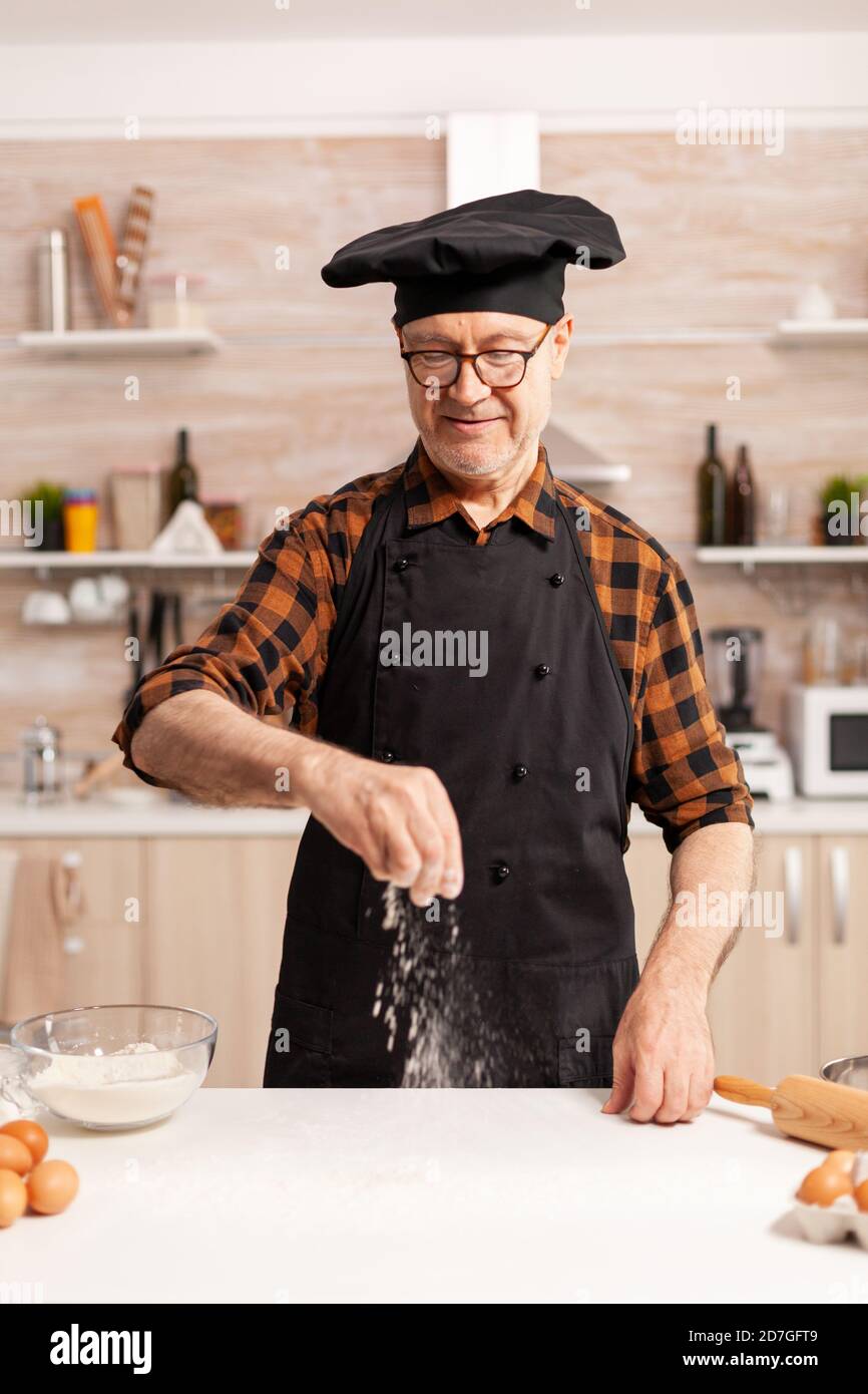 Senior chef in uniform using hi-res stock photography and images - Alamy