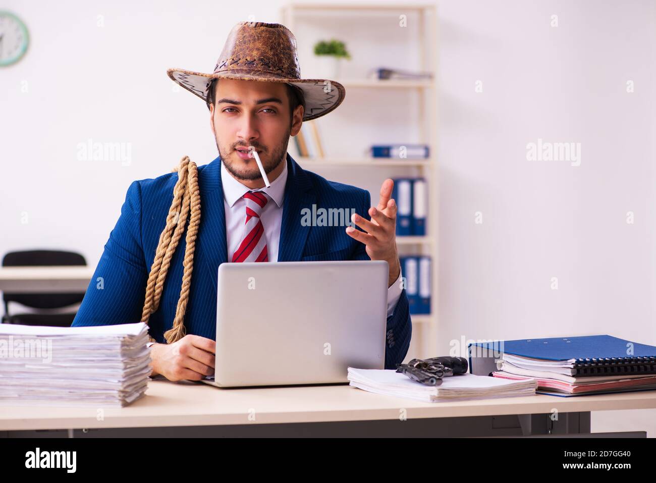 Young cowboy smoking cigarette hi-res stock photography and images - Alamy