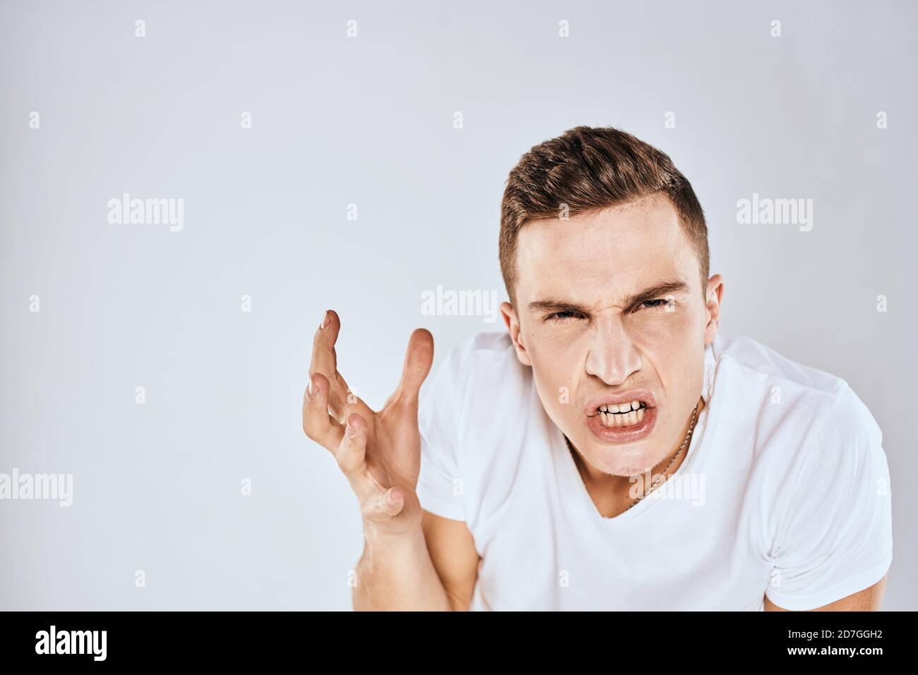 emotional man gesturing with his hands displeased facial expression ...