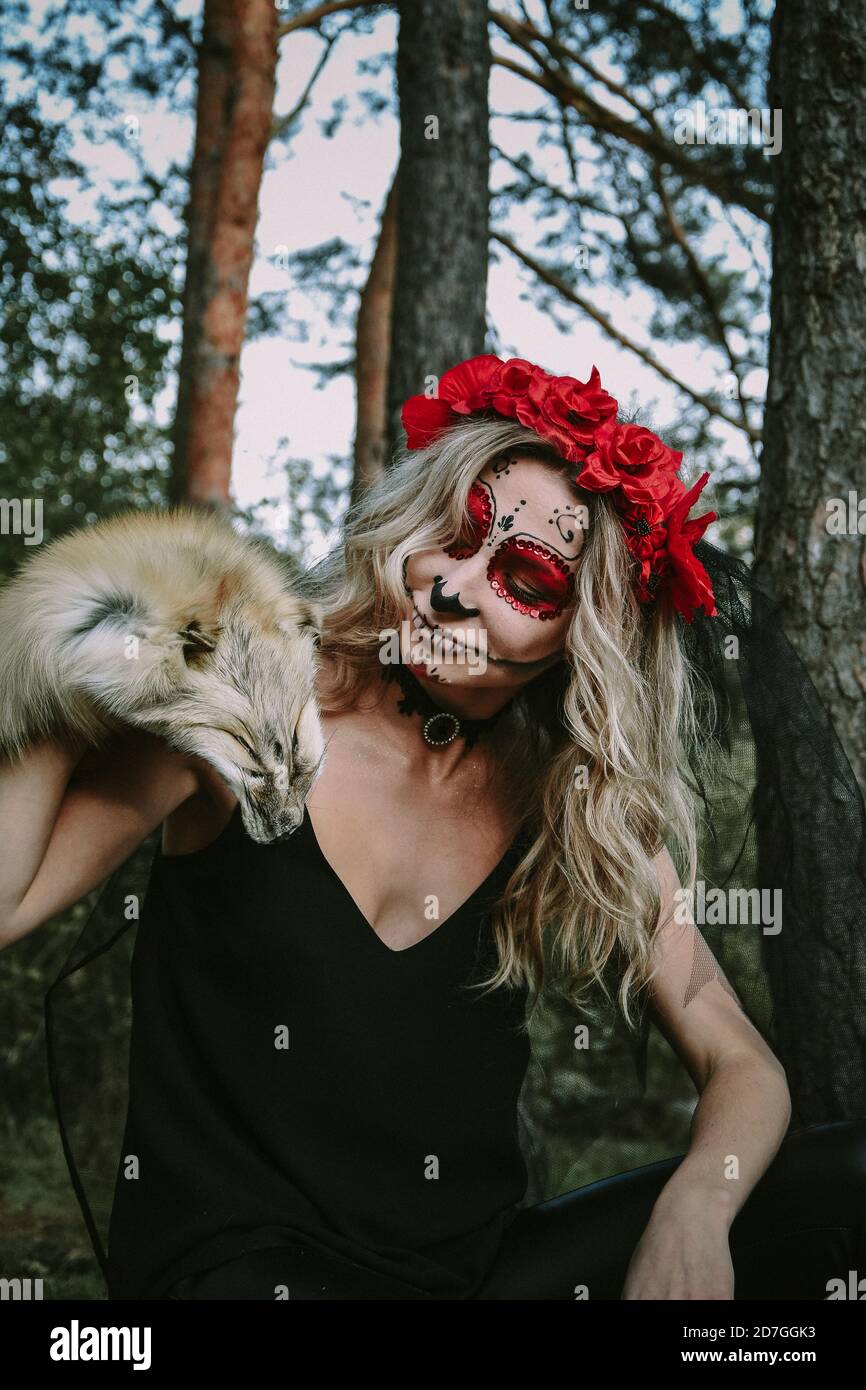 Happy Halloween concept. Scared horrible female sitting in special ...