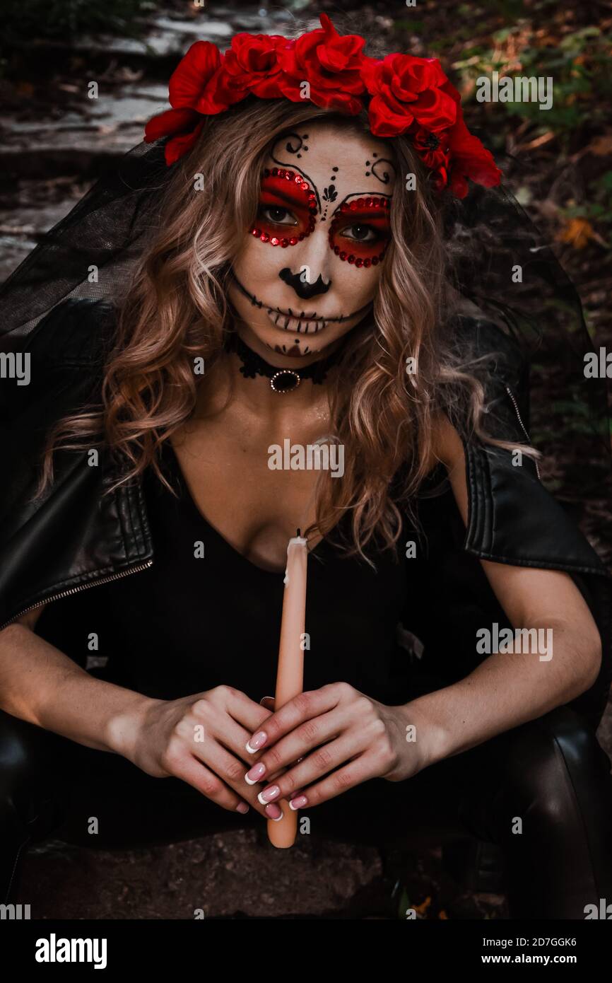 Happy Halloween concept. Scared horrible female in special outfit ...