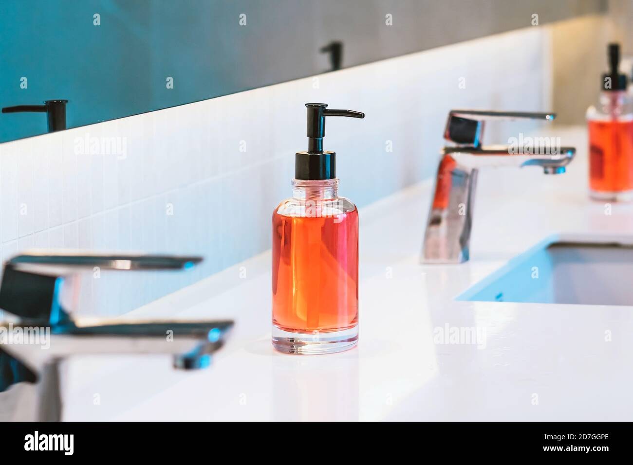 Orange sanitary liquid soap or antivirus soap sanitizer for hand ...