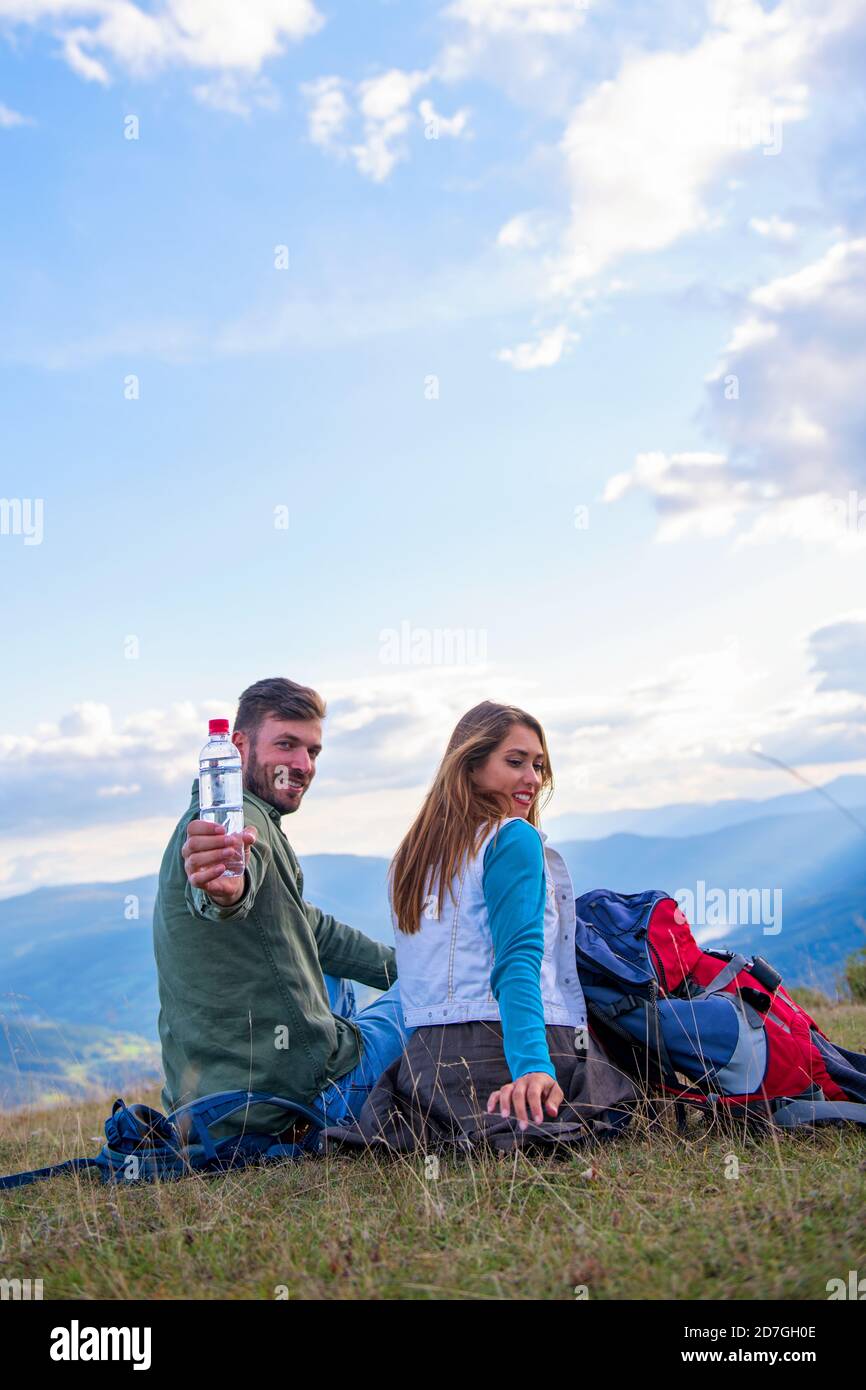 Family taking break on hike hi-res stock photography and images - Alamy