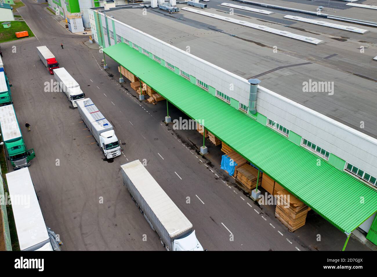 MOSTY, BELARUS - september, 2020: trucks waiting to be loaded at the ...