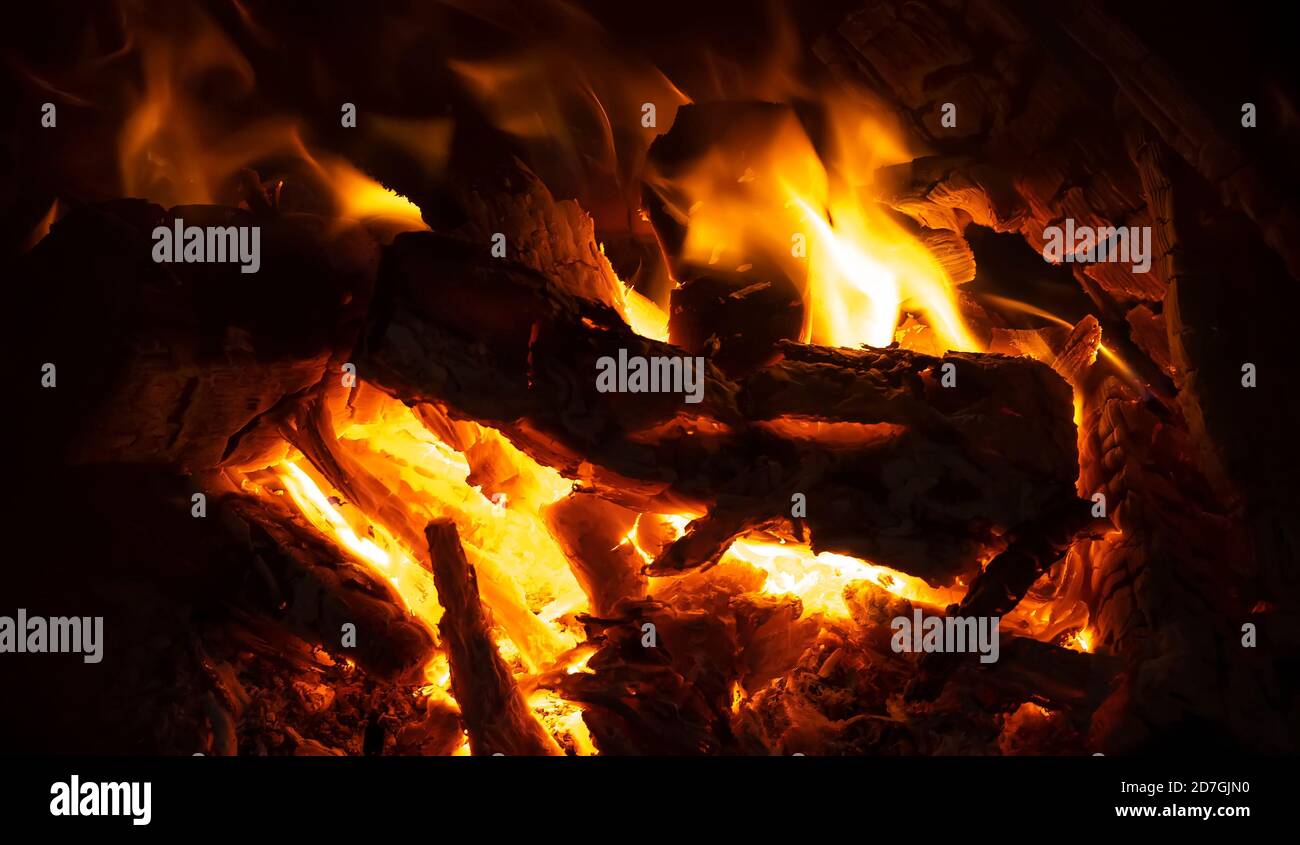 wood burning in the fireplace close-up. Fire background Stock Photo - Alamy