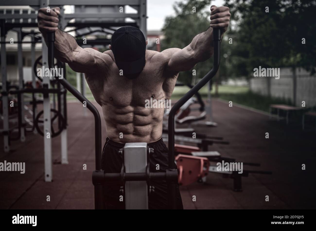 strong young sport athlete male with perfect abdominal muscles during ...