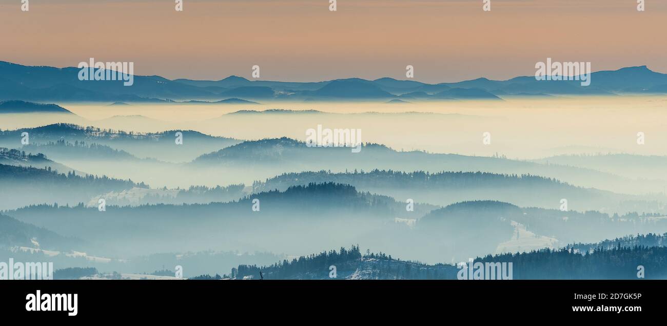Amazing mountain scenery with hills and mist from Barania Gora hill in ...