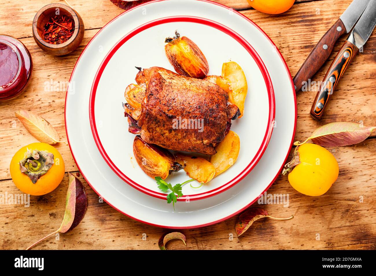Baked pork roll with autumn persimmon.Meat stuffed with fruits Stock ...