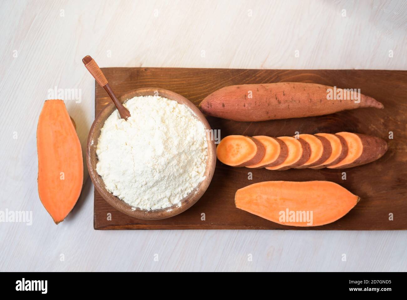 sweet potato flour in a wooden plate. sweet potatoes are a vegan ...