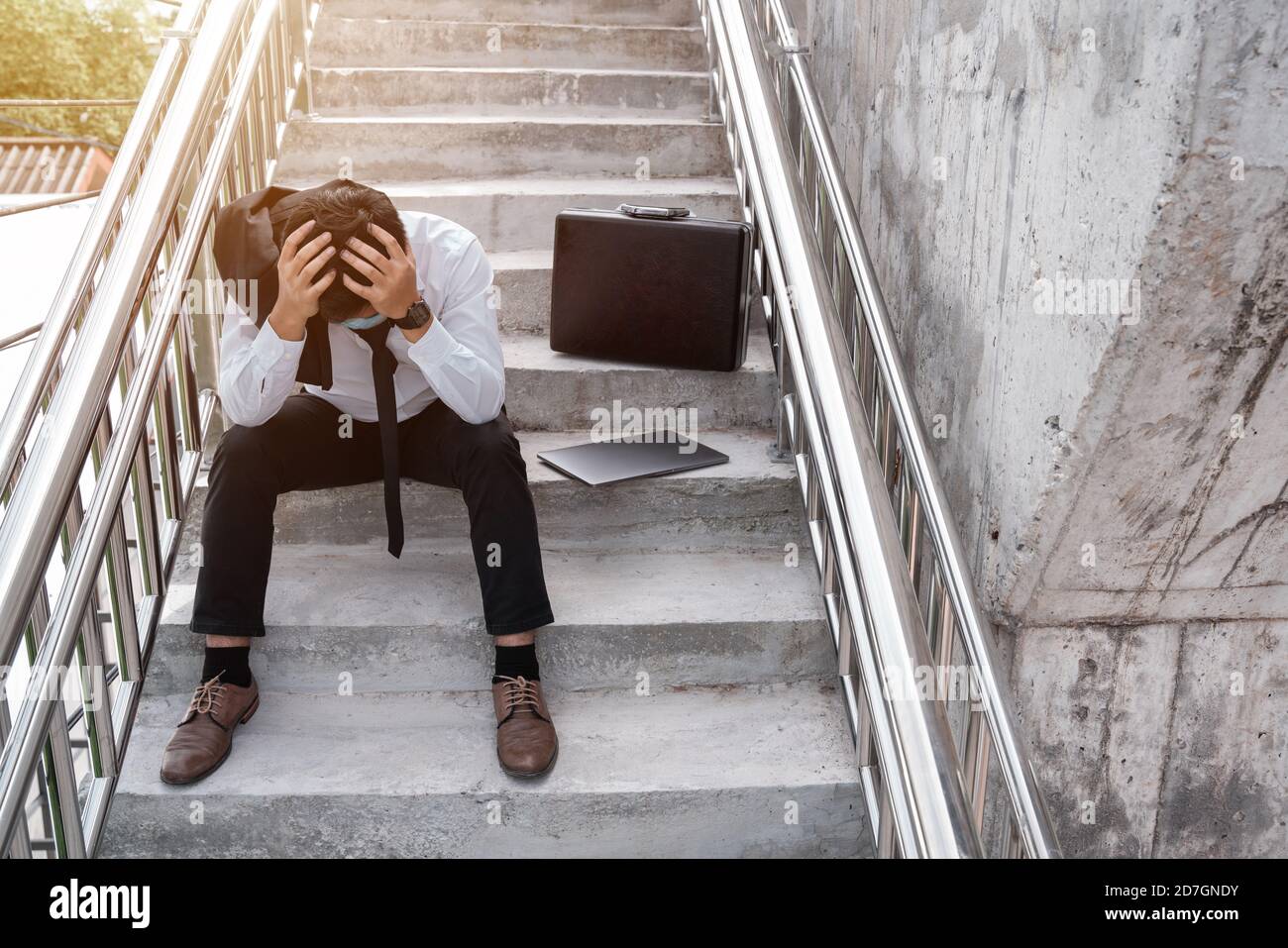 Depressed asian male covering hi-res stock photography and images - Alamy