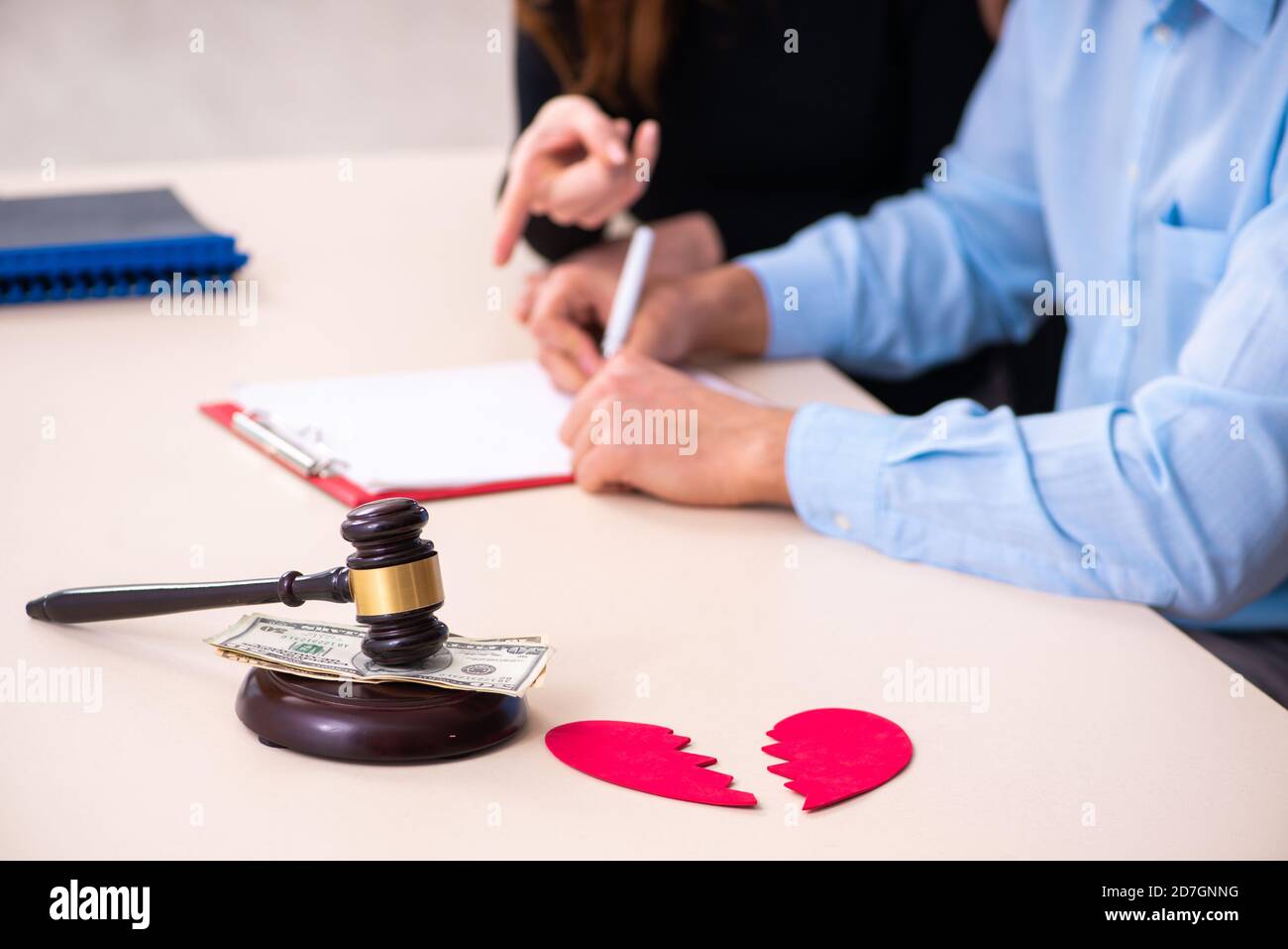 Couple divorcing in alimony concept Stock Photo - Alamy