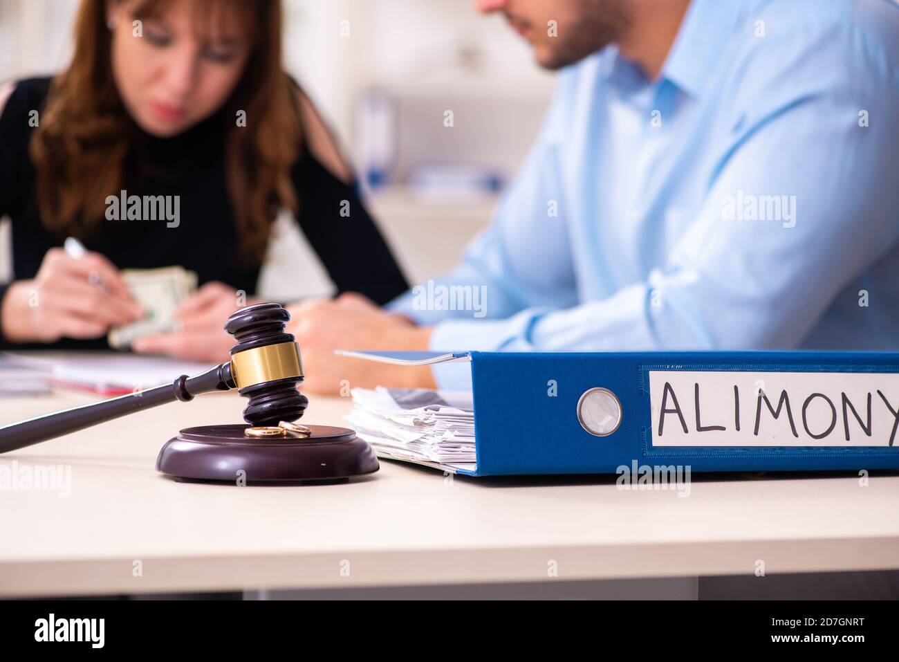 Couple divorcing in alimony concept Stock Photo - Alamy