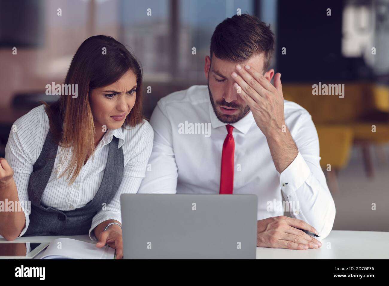 Business conflict. Business people arguing about document at the office ...