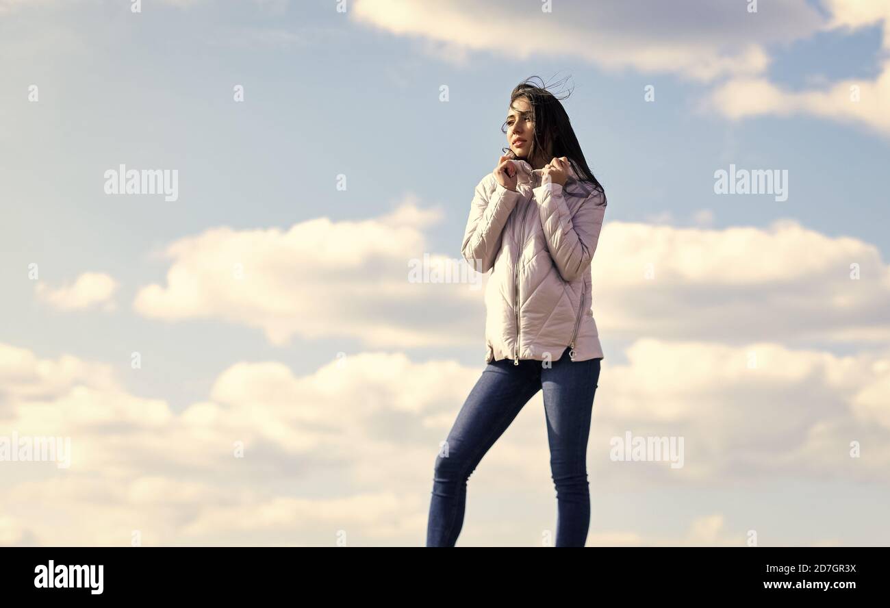 Freshness of wind. Woman fashion model outdoors. Woman enjoying cool ...