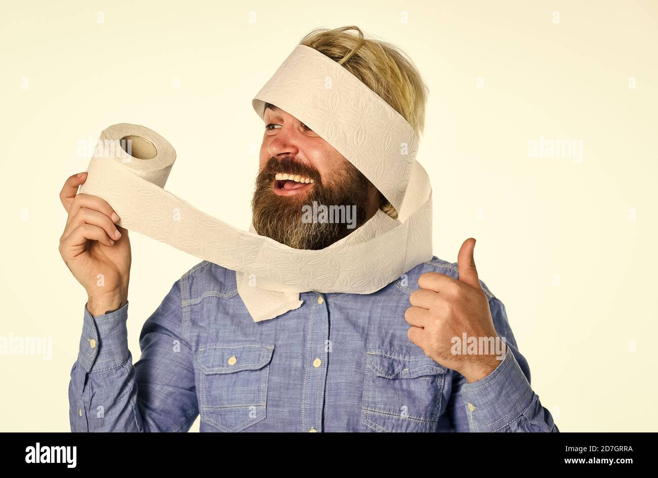 cleaner for life. man hold tissue roll in toilet. bearded man hold ...