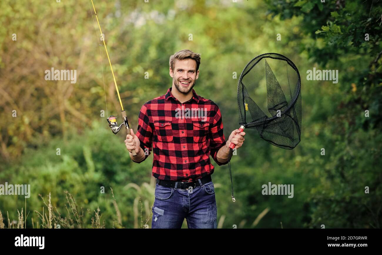 Handsome fly fisherman hi-res stock photography and images - Alamy