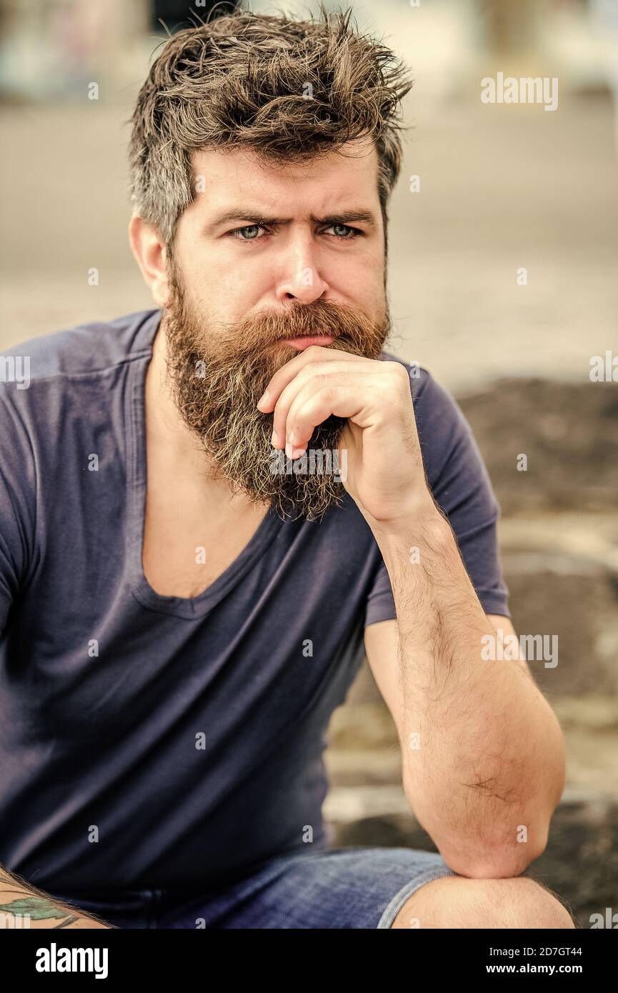 Making important choices. Man with beard and mustache thoughtful ...