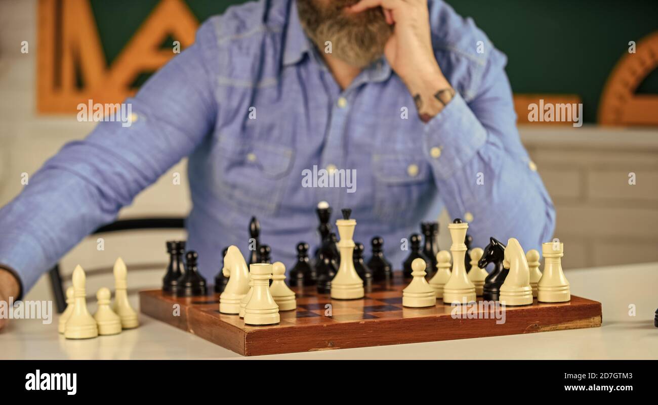 tournament skills. chess figures on wooden board. Focused school ...