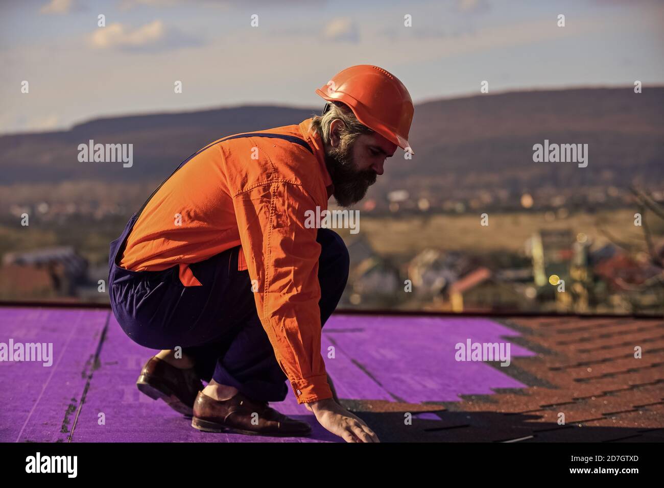 builder use roof tile. professional master repair roof. Flat roof ...