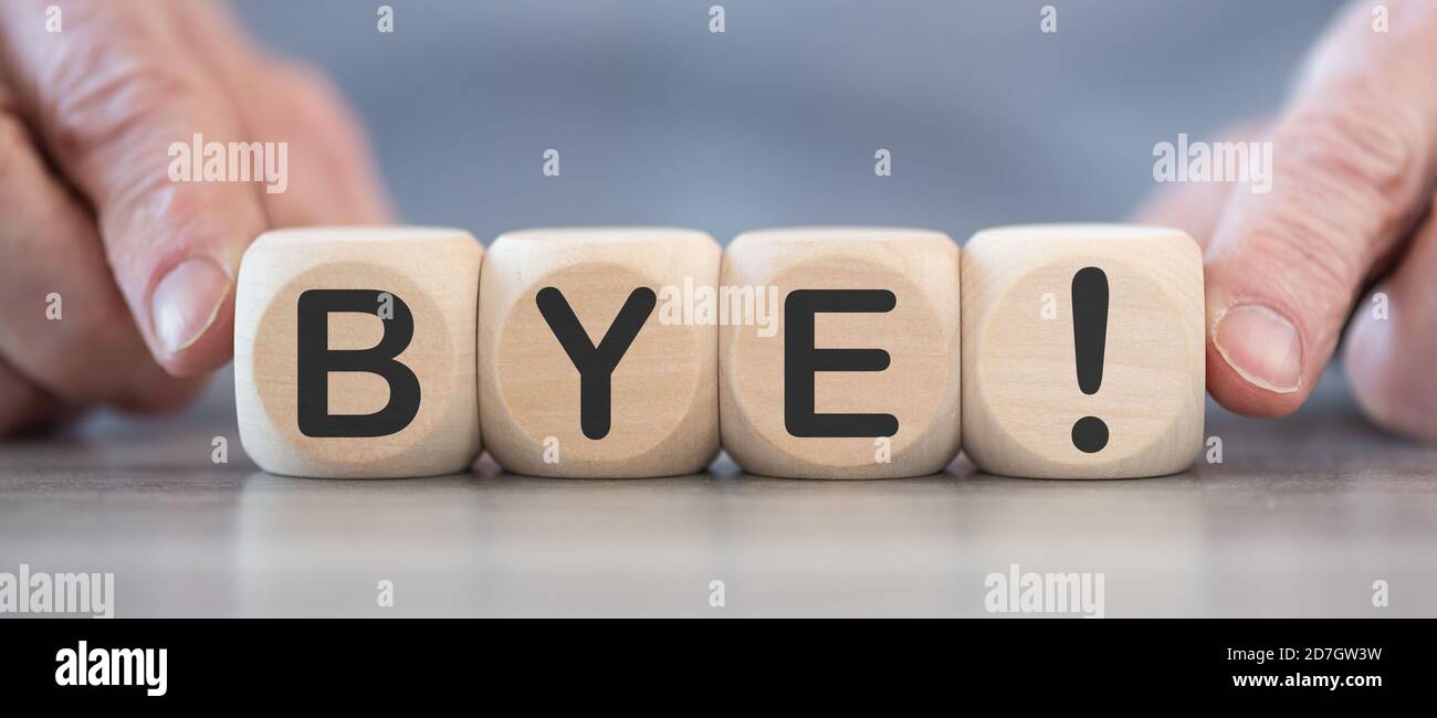 Concept of leaving with word bye on wooden cubes Stock Photo - Alamy