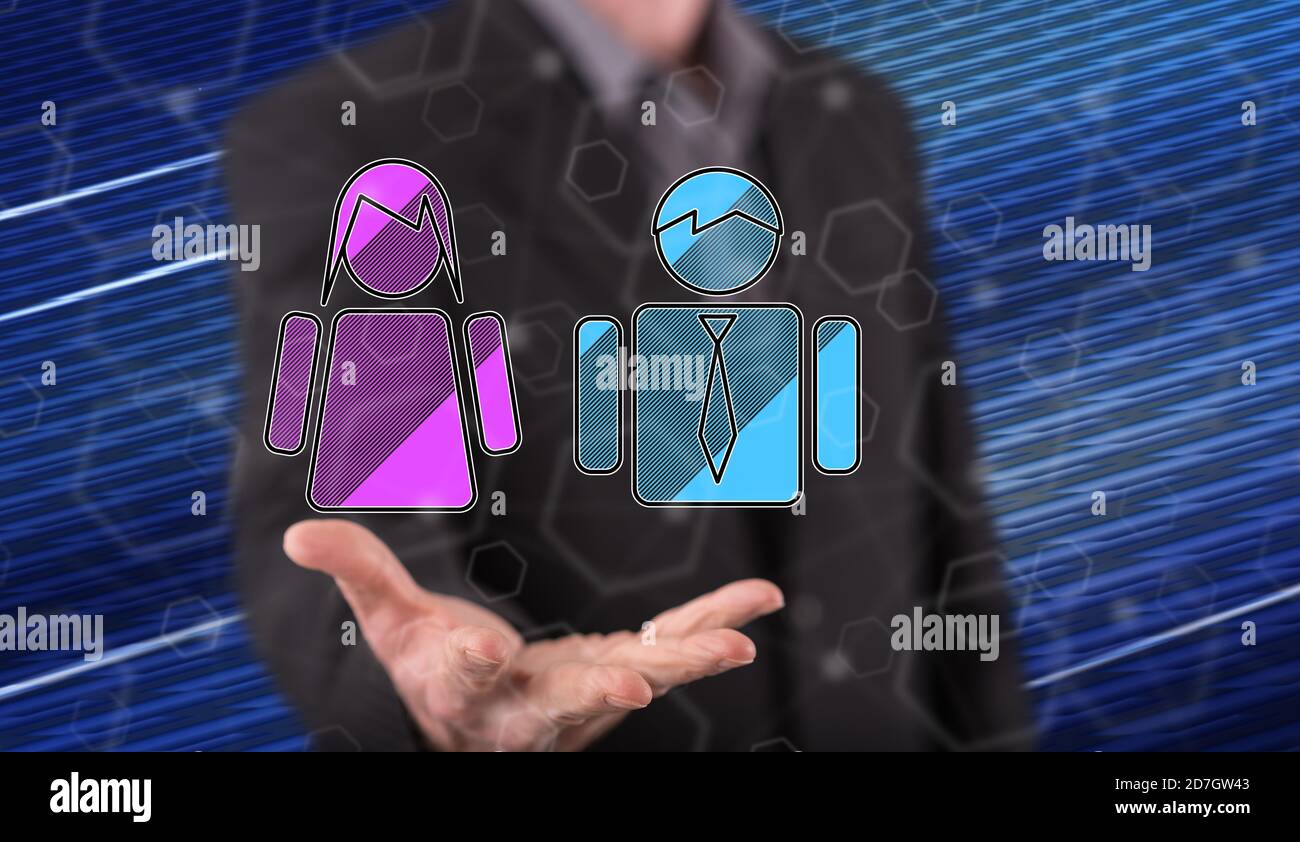 Gender equality concept above the hand of a man in background Stock ...
