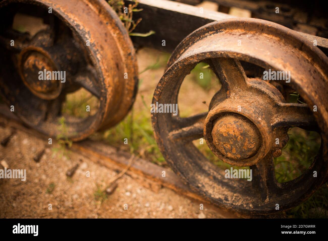 Close up shot of the rusty metal wheels of an abandoned wagon Stock ...