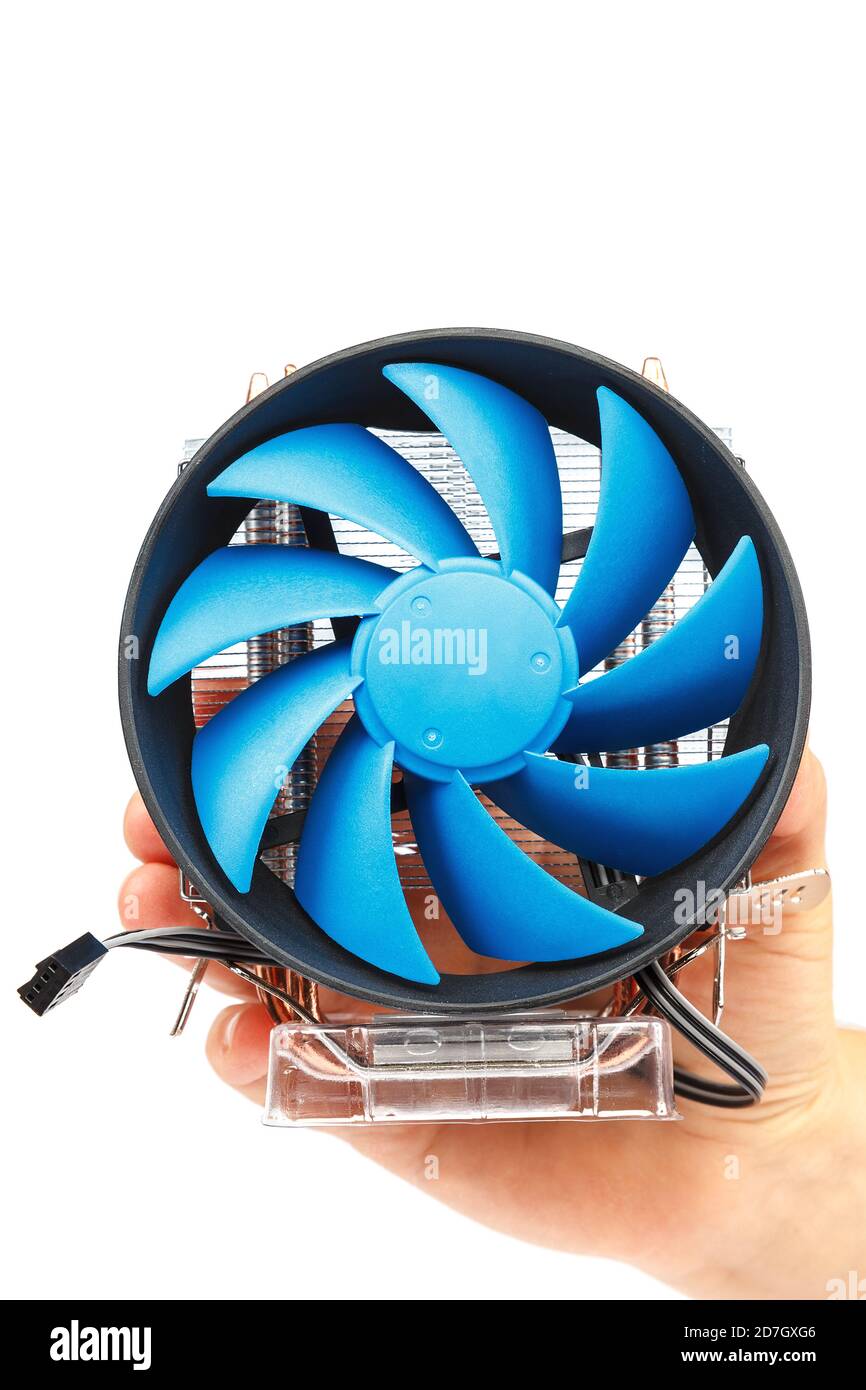 Powerful cooler and cooling radiator in the hand isolated on a white ...