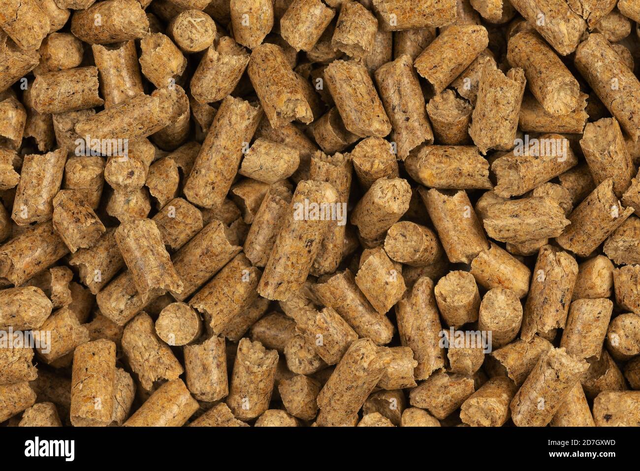 Brown wood pellets texture background. natural pile of wood pellets ...
