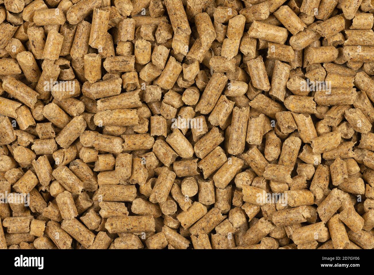 Brown wood pellets texture background. natural pile of wood pellets ...