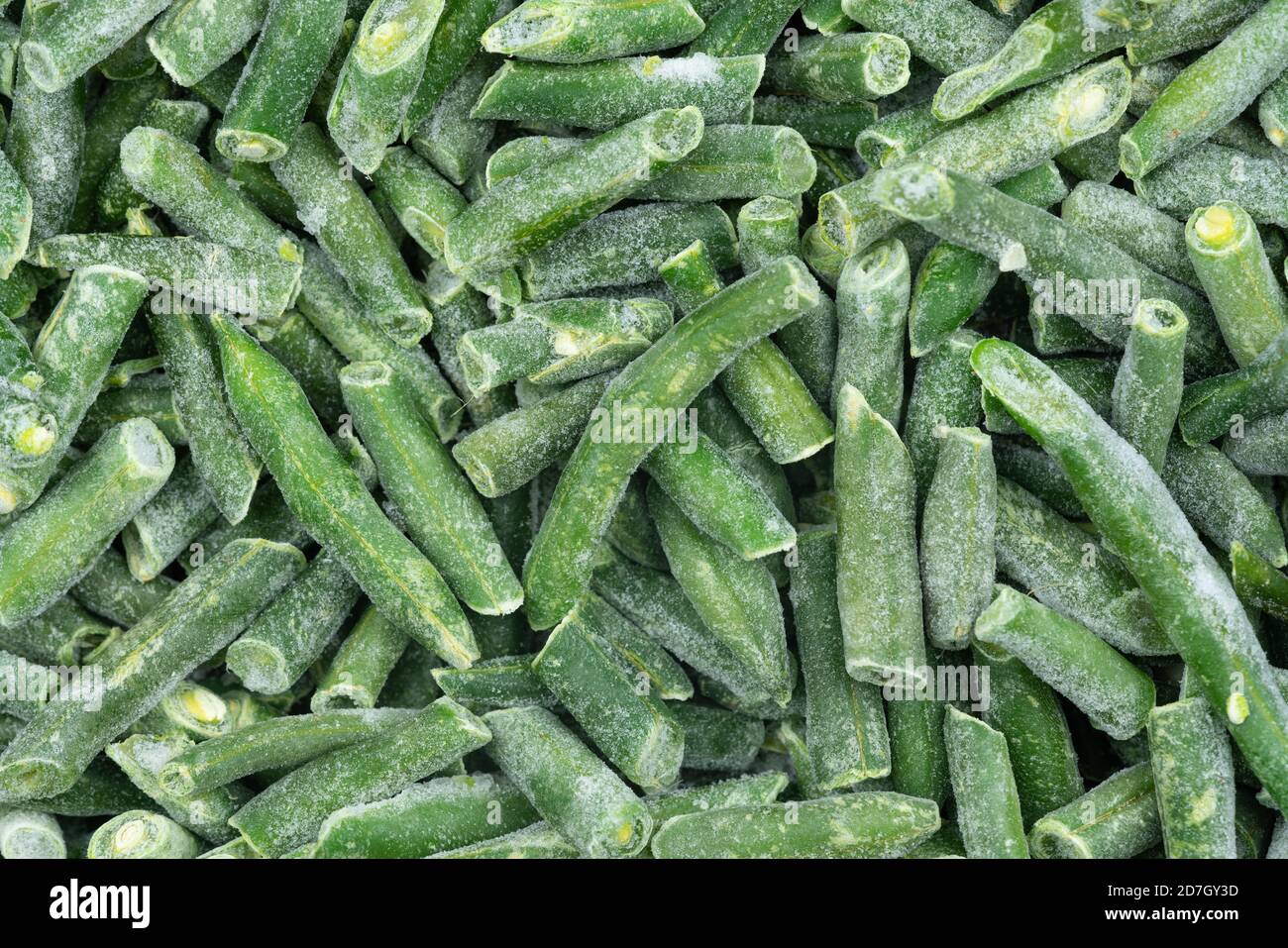 Frozen chopped green string beans texture background. iced beans ...