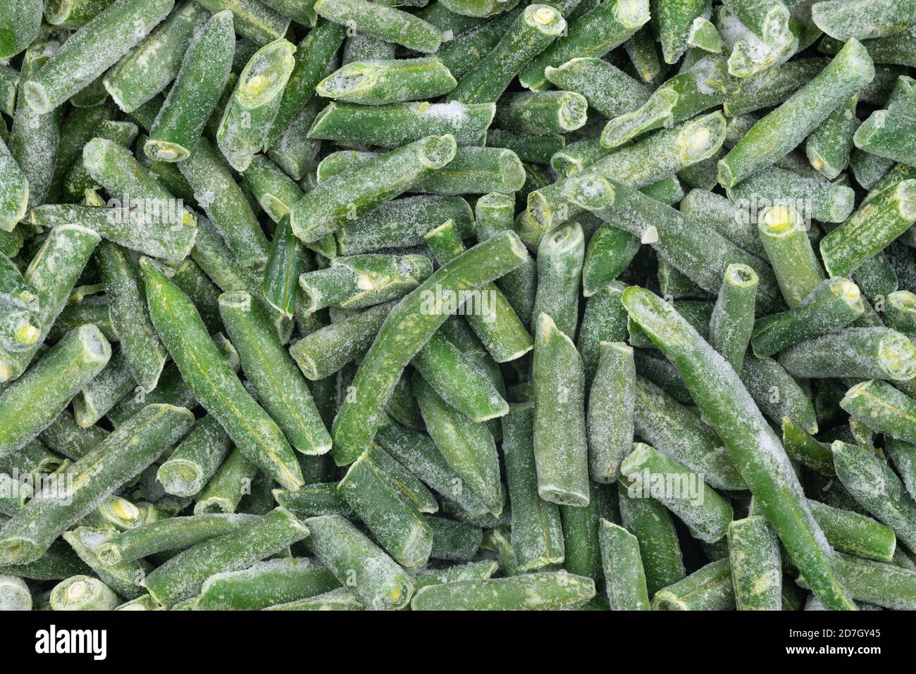 Frozen chopped green string beans texture background. iced beans ...