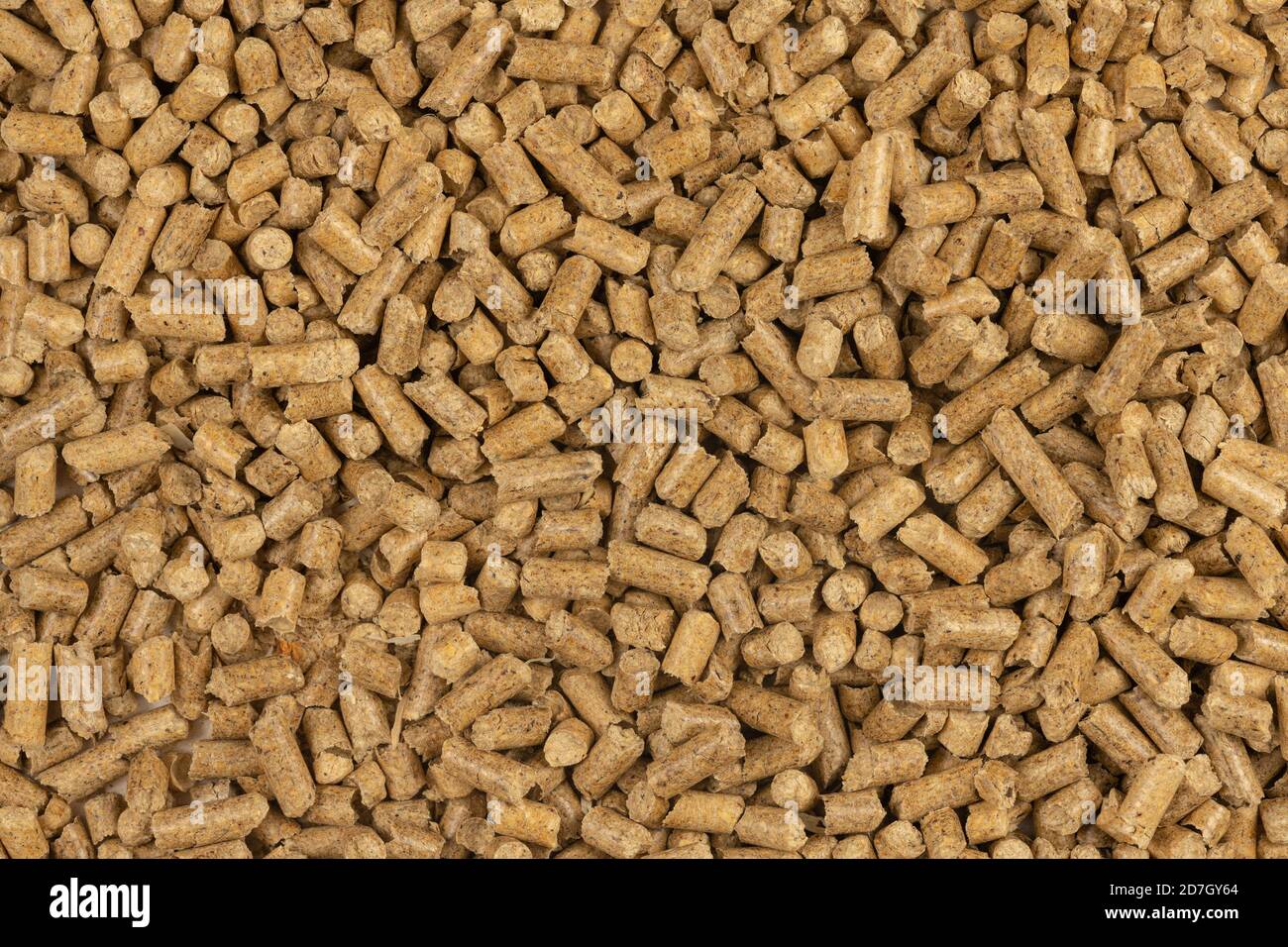 Brown wood pellets texture background. natural pile of wood pellets ...