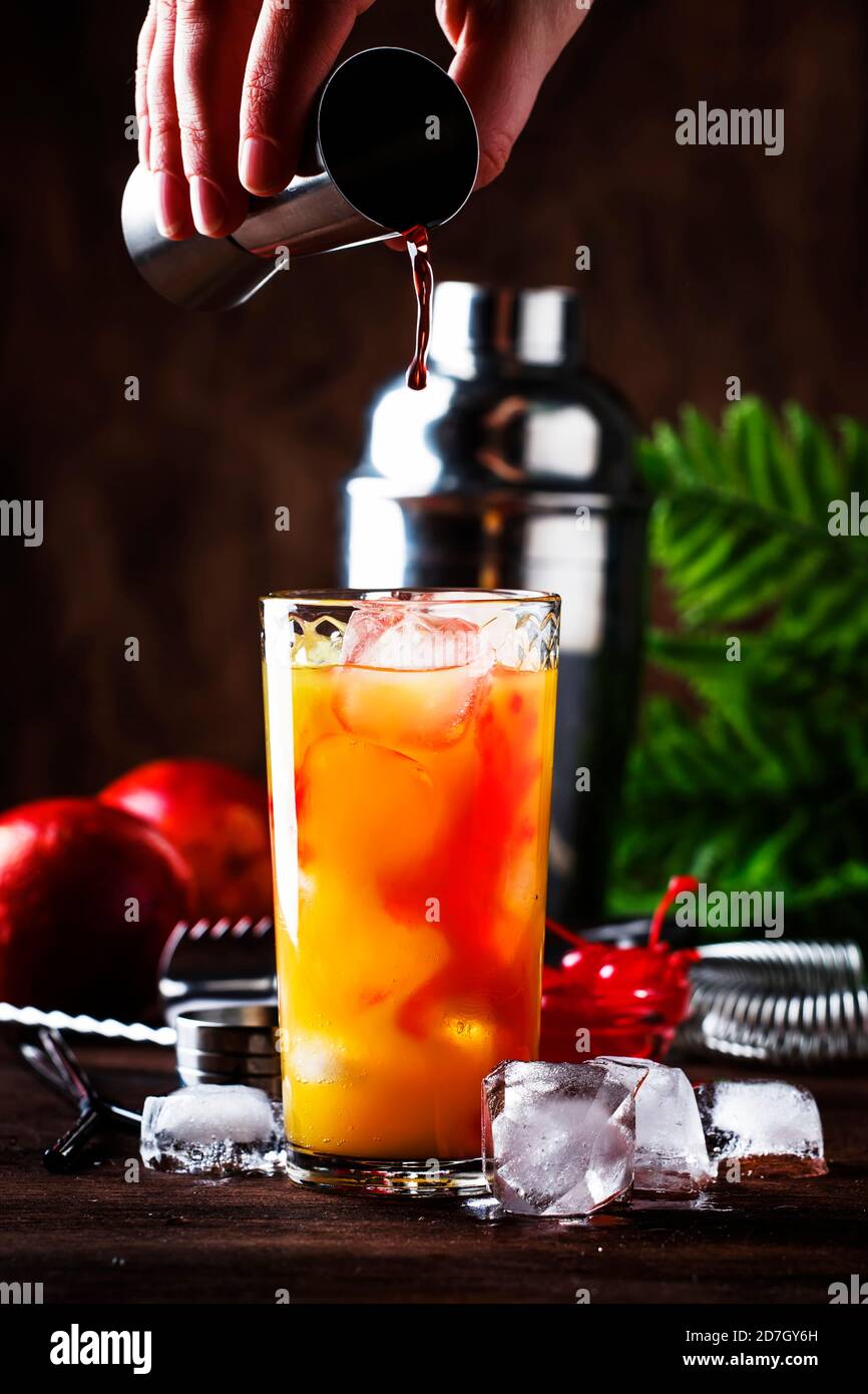 Summer tequila sunrise cocktail with silver tequila, grenadine syrup ...