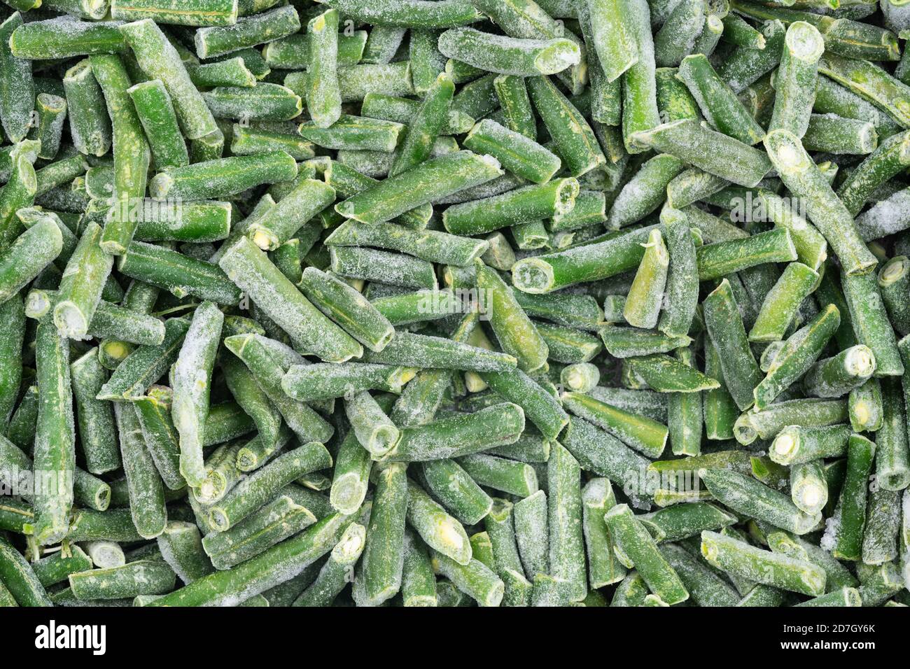 Frozen chopped green string beans texture background. iced beans ...