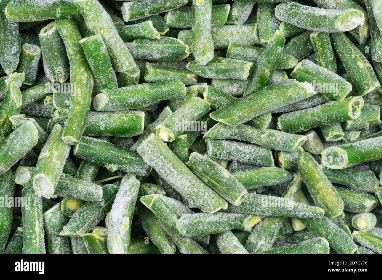 Frozen chopped green string beans texture background. iced beans ...