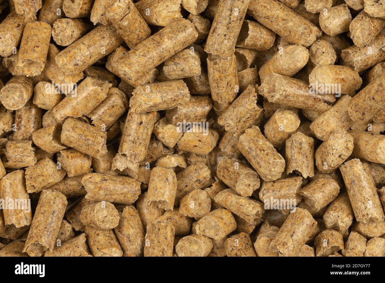 Brown wood pellets texture background. natural pile of wood pellets ...